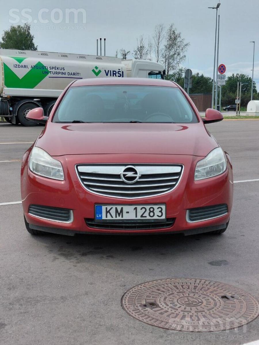 Red Opel Insignia 2010 in Riga, with an engine capacity of 1.60 L and mileage of 311 thousand km for 2400 €, photo 7 on AUTOMOTO.COM.LV