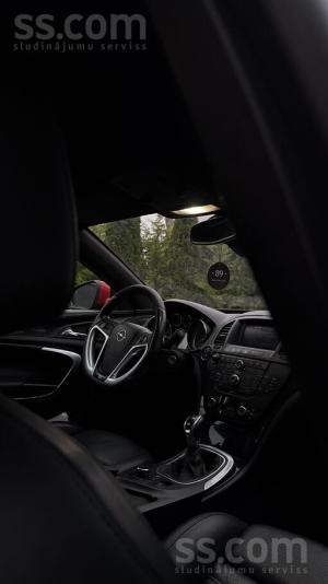 Red Opel Insignia 2010 in Riga, with an engine capacity of 2.00 L and mileage of 313 thousand km for 3000 €, photo 14 on AUTOMOTO.COM.LV