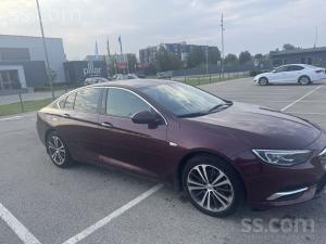 Red Opel Insignia 2018 in Riga, with an engine capacity of 2.00 L and mileage of 215 thousand km for 9950 €, photo  on AUTOMOTO.COM.LV
