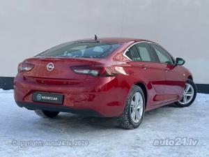 Red Opel Insignia 2022 in Riga, with an engine capacity of 1.50 L and mileage of 89 thousand km for 17000 €, photo 5 on AUTOMOTO.COM.LV
