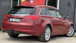 Red Opel Insignia 2009 in Riga, with an engine capacity of 2.00 L and mileage of 342 thousand km for 1990 €, photo 4 on AUTOMOTO.COM.LV