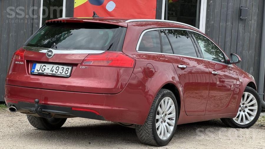 Red Opel Insignia 2009 in Riga, with an engine capacity of 2.00 L and mileage of 342 thousand km for 1990 €, photo 4 on AUTOMOTO.COM.LV
