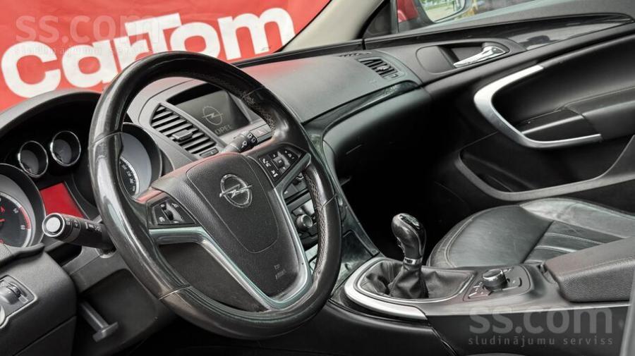 Red Opel Insignia 2009 in Riga, with an engine capacity of 2.00 L and mileage of 342 thousand km for 1990 €, photo 8 on AUTOMOTO.COM.LV