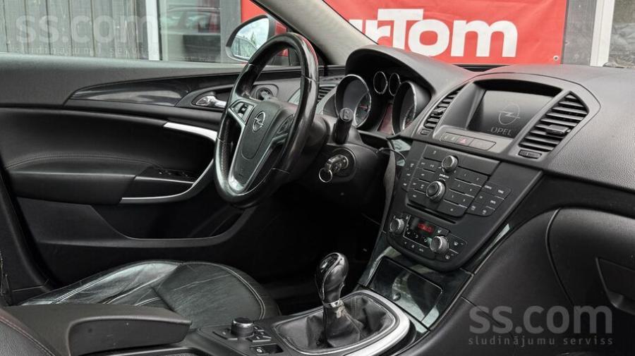 Red Opel Insignia 2009 in Riga, with an engine capacity of 2.00 L and mileage of 342 thousand km for 1990 €, photo 9 on AUTOMOTO.COM.LV