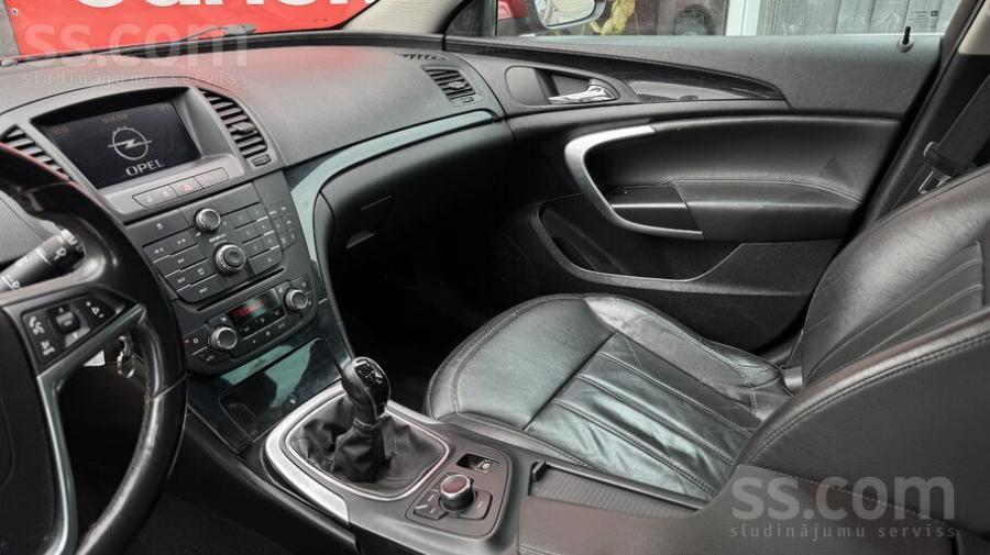 Red Opel Insignia 2009 in Riga, with an engine capacity of 2.00 L and mileage of 342 thousand km for 1990 €, photo 11 on AUTOMOTO.COM.LV