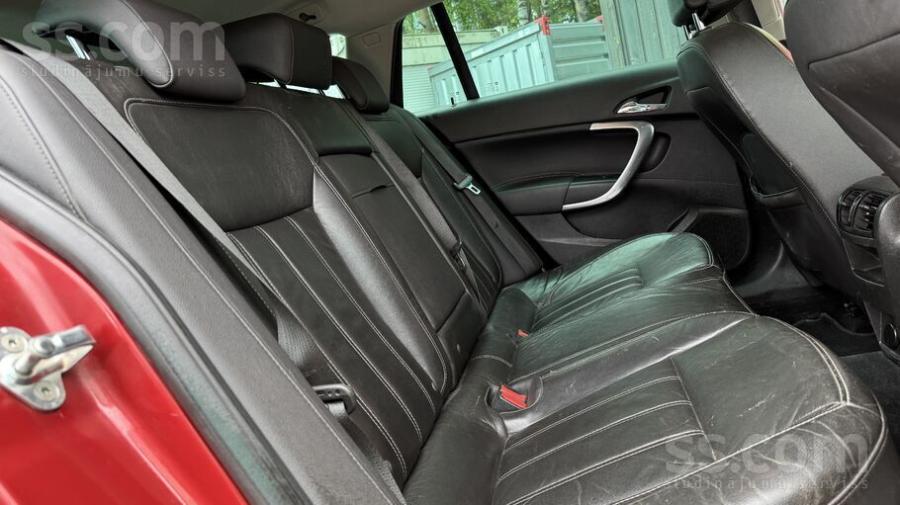 Red Opel Insignia 2009 in Riga, with an engine capacity of 2.00 L and mileage of 342 thousand km for 1990 €, photo 13 on AUTOMOTO.COM.LV