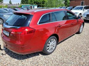 Red Opel Insignia 2009 in Daugavpils, with an engine capacity of 2.00 L and mileage of 138 thousand km for 3990 €, photo 6 on AUTOMOTO.COM.LV