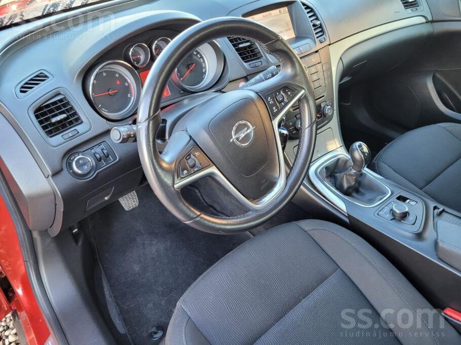 Red Opel Insignia 2009 in Daugavpils, with an engine capacity of 2.00 L and mileage of 138 thousand km for 3990 €, photo 10 on AUTOMOTO.COM.LV