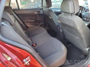 Red Opel Insignia 2009 in Daugavpils, with an engine capacity of 2.00 L and mileage of 138 thousand km for 3990 €, photo 13 on AUTOMOTO.COM.LV