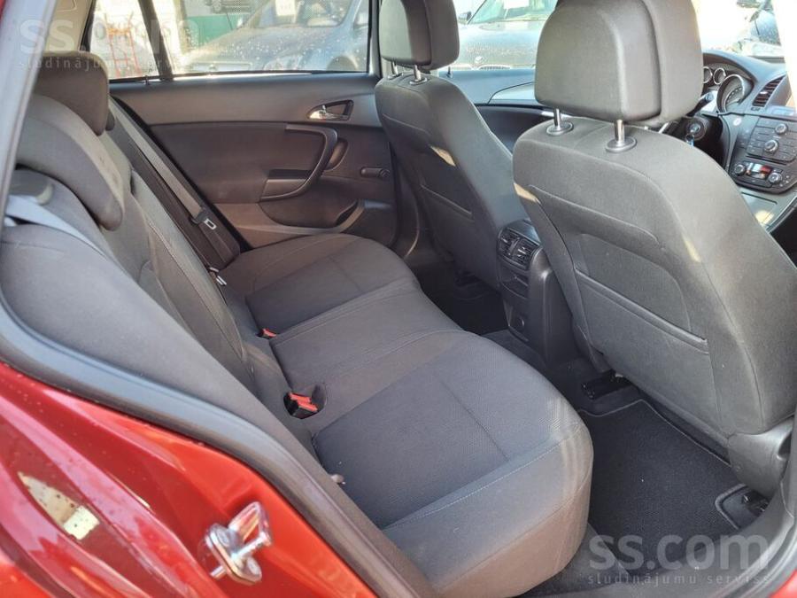 Red Opel Insignia 2009 in Daugavpils, with an engine capacity of 2.00 L and mileage of 138 thousand km for 3990 €, photo 13 on AUTOMOTO.COM.LV