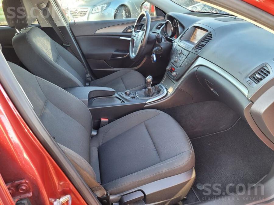 Red Opel Insignia 2009 in Daugavpils, with an engine capacity of 2.00 L and mileage of 138 thousand km for 3990 €, photo 14 on AUTOMOTO.COM.LV
