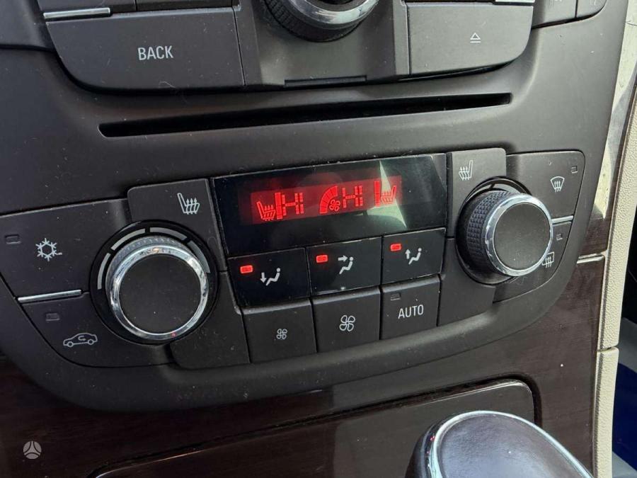 Красный Опель Инсигния 2011 в Вильнюс, объемом двигателя 1.96 л и пробегом 317 тыс. км за 1950 €, фото 15 на AUTOMOTO.COM.LV