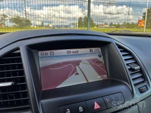 Red Opel Insignia 2012 in Saldus, with an engine capacity of 2.00 L and mileage of 284 thousand km for 2990 €, photo 17 on AUTOMOTO.COM.LV
