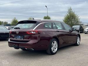 Red Opel Insignia 2019 in Marijampole, with an engine capacity of 2.00 L and mileage of 298 thousand km for 10450 €, photo 10 on AUTOMOTO.COM.LV
