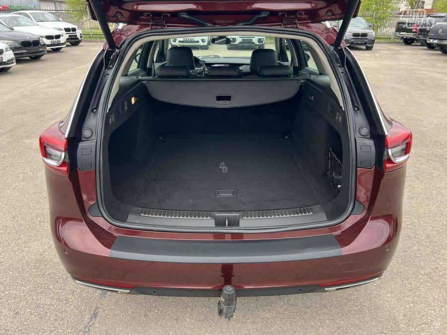 Red Opel Insignia 2019 in Marijampole, with an engine capacity of 2.00 L and mileage of 298 thousand km for 10450 €, photo 12 on AUTOMOTO.COM.LV