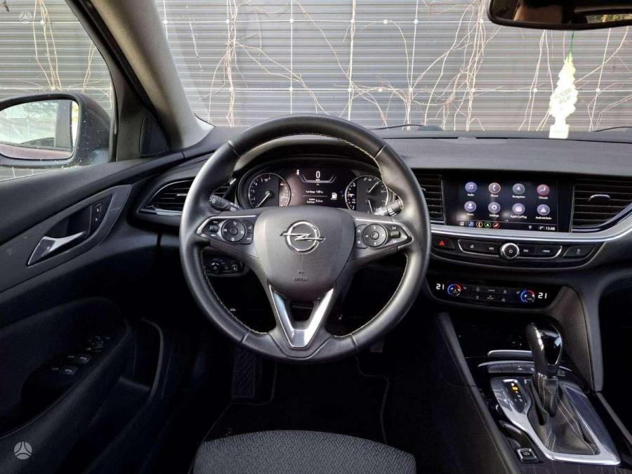 Red Opel Insignia 2019 in Vilnius, with an engine capacity of 1.96 L and mileage of 282 thousand km for 7900 €, photo 11 on AUTOMOTO.COM.LV