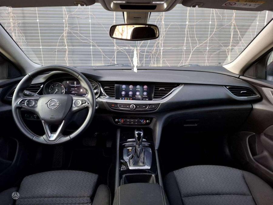 Red Opel Insignia 2019 in Vilnius, with an engine capacity of 1.96 L and mileage of 282 thousand km for 7900 €, photo 12 on AUTOMOTO.COM.LV