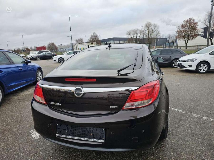 Violet Opel Insignia 2011 in Kaunas, with an engine capacity of 2.00 L and mileage of 279 thousand km for 3950 €, photo 23 on AUTOMOTO.COM.LV