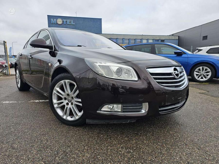 Violet Opel Insignia 2011 in Kaunas, with an engine capacity of 2.00 L and mileage of 279 thousand km for 3950 €, photo 26 on AUTOMOTO.COM.LV