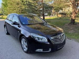 Violet Opel Insignia 2011 in Marijampole, with an engine capacity of 1.96 L and mileage of 150 thousand km for 3400 €, photo  on AUTOMOTO.COM.LV