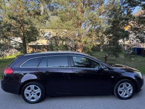 Violet Opel Insignia 2011 in Marijampole, with an engine capacity of 1.96 L and mileage of 150 thousand km for 3400 €, photo 5 on AUTOMOTO.COM.LV