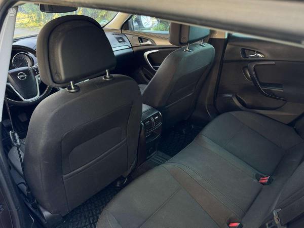 Violet Opel Insignia 2011 in Marijampole, with an engine capacity of 1.96 L and mileage of 150 thousand km for 3400 €, photo 8 on AUTOMOTO.COM.LV