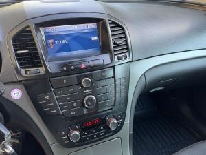 Violet Opel Insignia 2011 in Marijampole, with an engine capacity of 1.96 L and mileage of 150 thousand km for 3400 €, photo 12 on AUTOMOTO.COM.LV