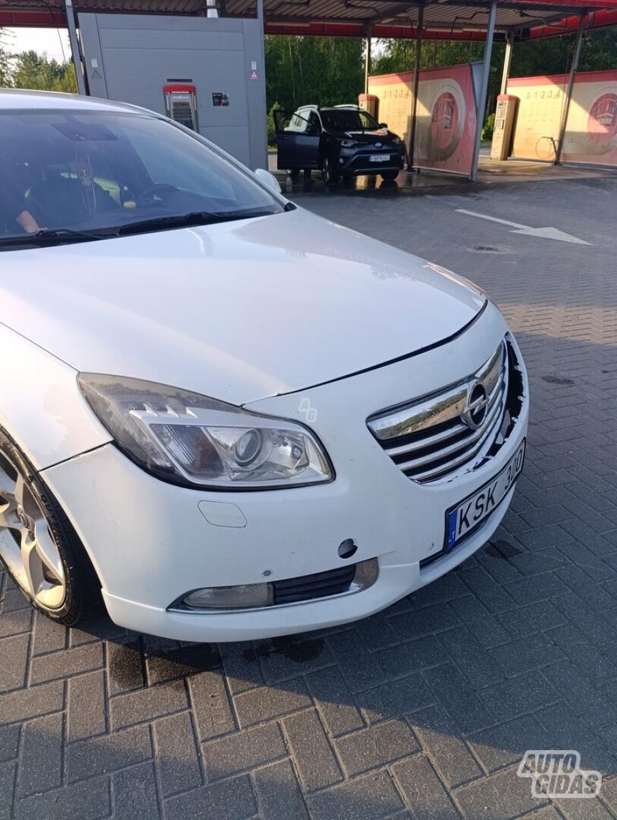 White Opel Insignia 2013 in Vilnius, with an engine capacity of 1.90 L and mileage of 0 thousand km for 2250 €, photo 7 on AUTOMOTO.COM.LV