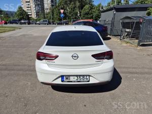 White Opel Insignia 2017 in Riga, with an engine capacity of 1.60 L and mileage of 209 thousand km for 8990 €, photo 8 on AUTOMOTO.COM.LV
