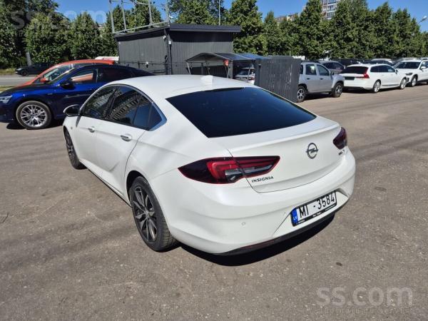 White Opel Insignia 2017 in Riga, with an engine capacity of 1.60 L and mileage of 209 thousand km for 8990 €, photo 8 on AUTOMOTO.COM.LV