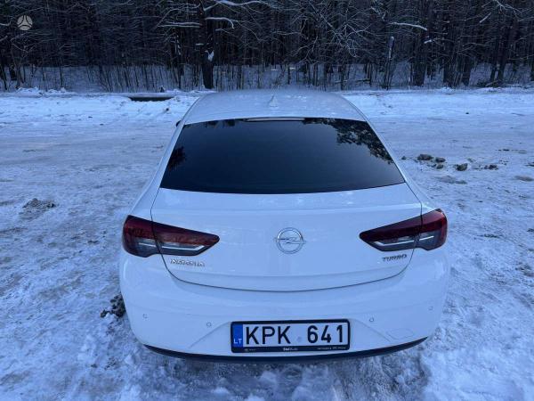 White Opel Insignia 2018 in Vilnius, with an engine capacity of 1.49 L and mileage of 67 thousand km for 14500 €, photo 5 on AUTOMOTO.COM.LV