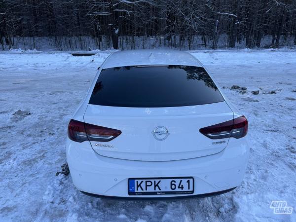 White Opel Insignia 2018 in Vilnius, with an engine capacity of 1.50 L and mileage of 67 thousand km for 13900 €, photo 5 on AUTOMOTO.COM.LV