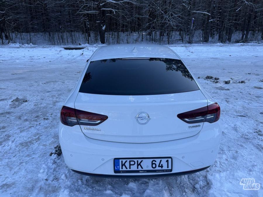 White Opel Insignia 2018 in Vilnius, with an engine capacity of 1.50 L and mileage of 67 thousand km for 13900 €, photo 6 on AUTOMOTO.COM.LV