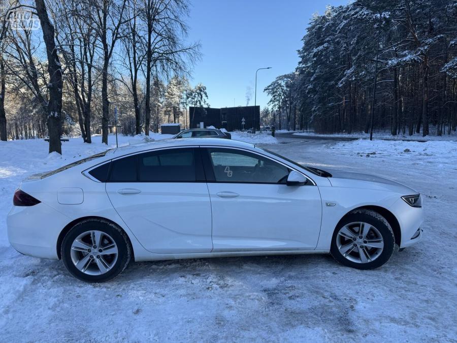White Opel Insignia 2018 in Vilnius, with an engine capacity of 1.50 L and mileage of 67 thousand km for 13900 €, photo 8 on AUTOMOTO.COM.LV