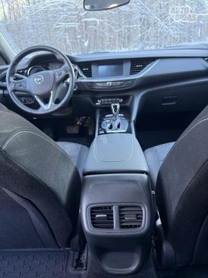 White Opel Insignia 2018 in Vilnius, with an engine capacity of 1.50 L and mileage of 67 thousand km for 13900 €, photo 12 on AUTOMOTO.COM.LV