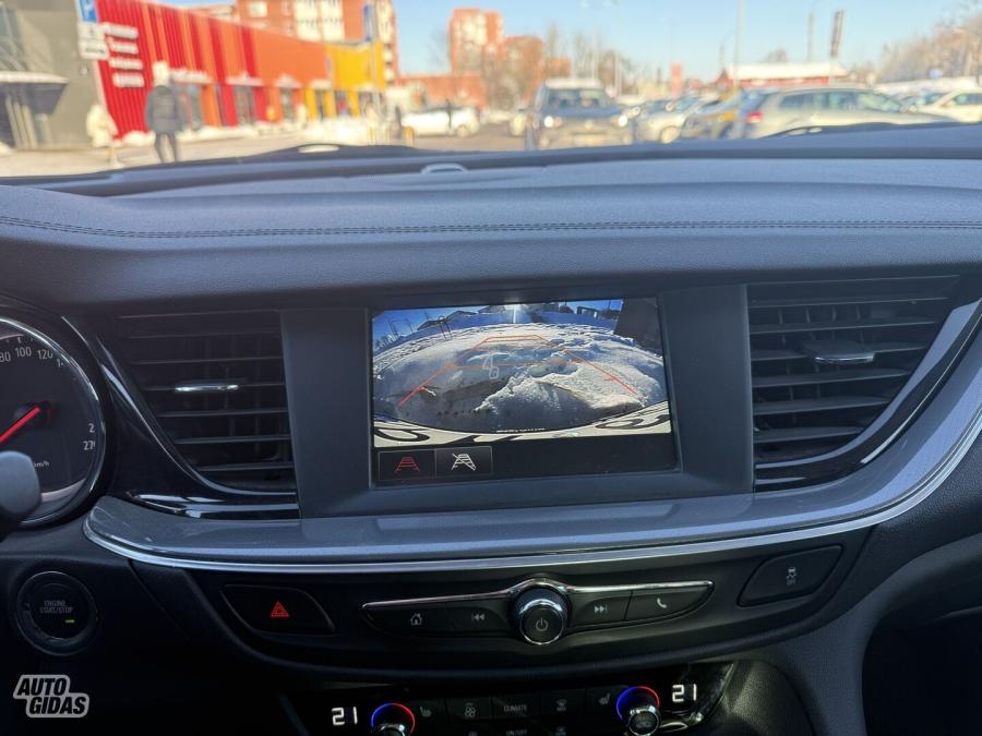White Opel Insignia 2018 in Vilnius, with an engine capacity of 1.50 L and mileage of 67 thousand km for 13900 €, photo 16 on AUTOMOTO.COM.LV