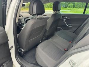 White Opel Insignia 2009 in Riga, with an engine capacity of 2.00 L and mileage of 0 thousand km for 2590 €, photo 12 on AUTOMOTO.COM.LV