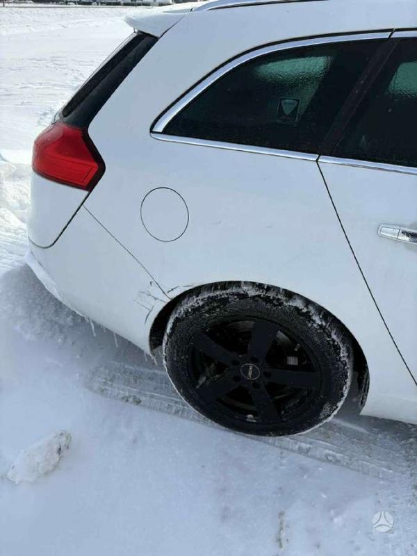 White Opel Insignia 2010 in Kaunas, with an engine capacity of 1.96 L and mileage of 312 thousand km for 3150 €, photo 7 on AUTOMOTO.COM.LV