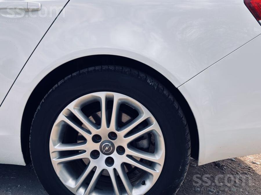 Balts Opel Insignia 2010 Liepāja, ar dzinēja tilpumu 2.00 L un nobraukumu 261 tūkst. km par 3850 €, foto 9 vietnē AUTOMOTO.COM.LV