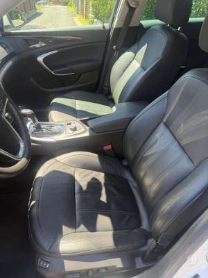White Opel Insignia 2010 in Kaunas, with an engine capacity of 1.96 L and mileage of 257 thousand km for 4200 €, photo 13 on AUTOMOTO.COM.LV