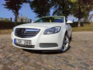 White Opel Insignia 2010 in Silute, with an engine capacity of 1.96 L and mileage of 344 thousand km for 2600 €, photo 3 on AUTOMOTO.COM.LV