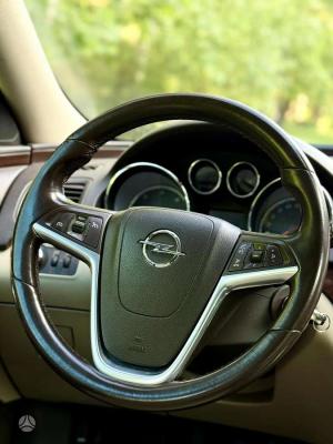 White Opel Insignia 2010 in Vilnius, with an engine capacity of 1.96 L and mileage of 312 thousand km for 2300 €, photo 10 on AUTOMOTO.COM.LV