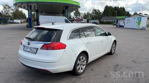 White Opel Insignia 2012 in Riga, with an engine capacity of 2.00 L and mileage of 0 thousand km for 1790 €, photo 4 on AUTOMOTO.COM.LV