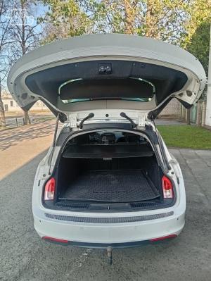 White Opel Insignia 2013 in Vilnius, with an engine capacity of 2.00 L and mileage of 325 thousand km for 3700 €, photo 14 on AUTOMOTO.COM.LV