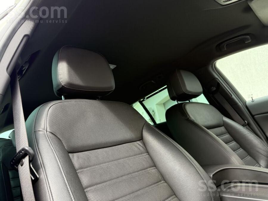White Opel Insignia 2014 in Tukums, with an engine capacity of 2.00 L and mileage of 225 thousand km for 6999 €, photo 9 on AUTOMOTO.COM.LV