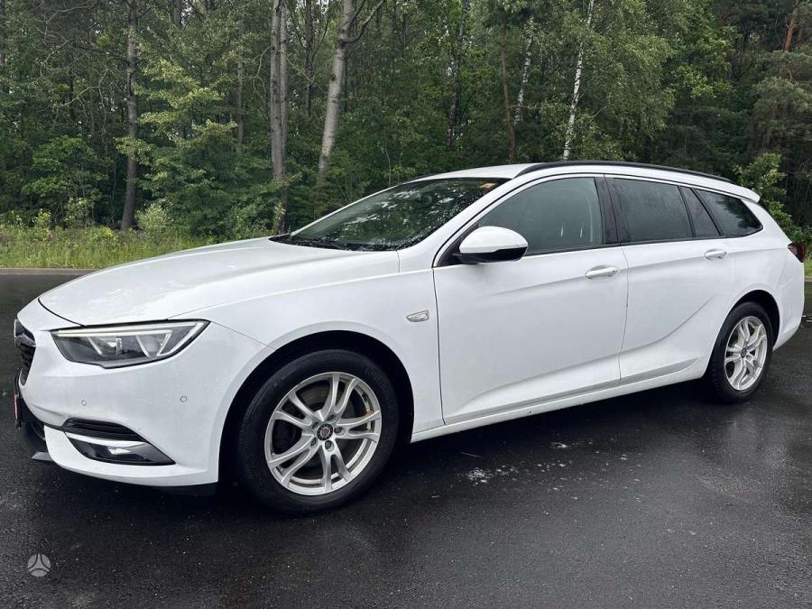 White Opel Insignia 2019 in Kaunas, with an engine capacity of 1.96 L and mileage of 176 thousand km for 8900 €, photo 11 on AUTOMOTO.COM.LV