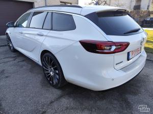 White Opel Insignia 2020 in Utena, with an engine capacity of 2.00 L and mileage of 200 thousand km for 9990 €, photo 9 on AUTOMOTO.COM.LV