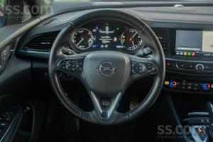 White Opel Insignia 2021 in Riga, with an engine capacity of 2.00 L and mileage of 125 thousand km for 15450 €, photo 11 on AUTOMOTO.COM.LV