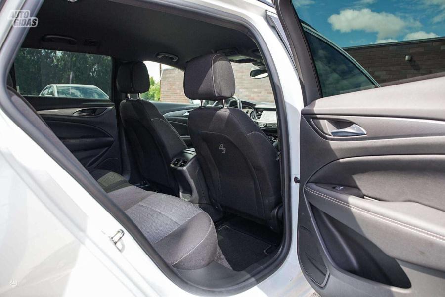 White Opel Insignia 2021 in Kaunas, with an engine capacity of 2.00 L and mileage of 114 thousand km for 11950 €, photo 36 on AUTOMOTO.COM.LV