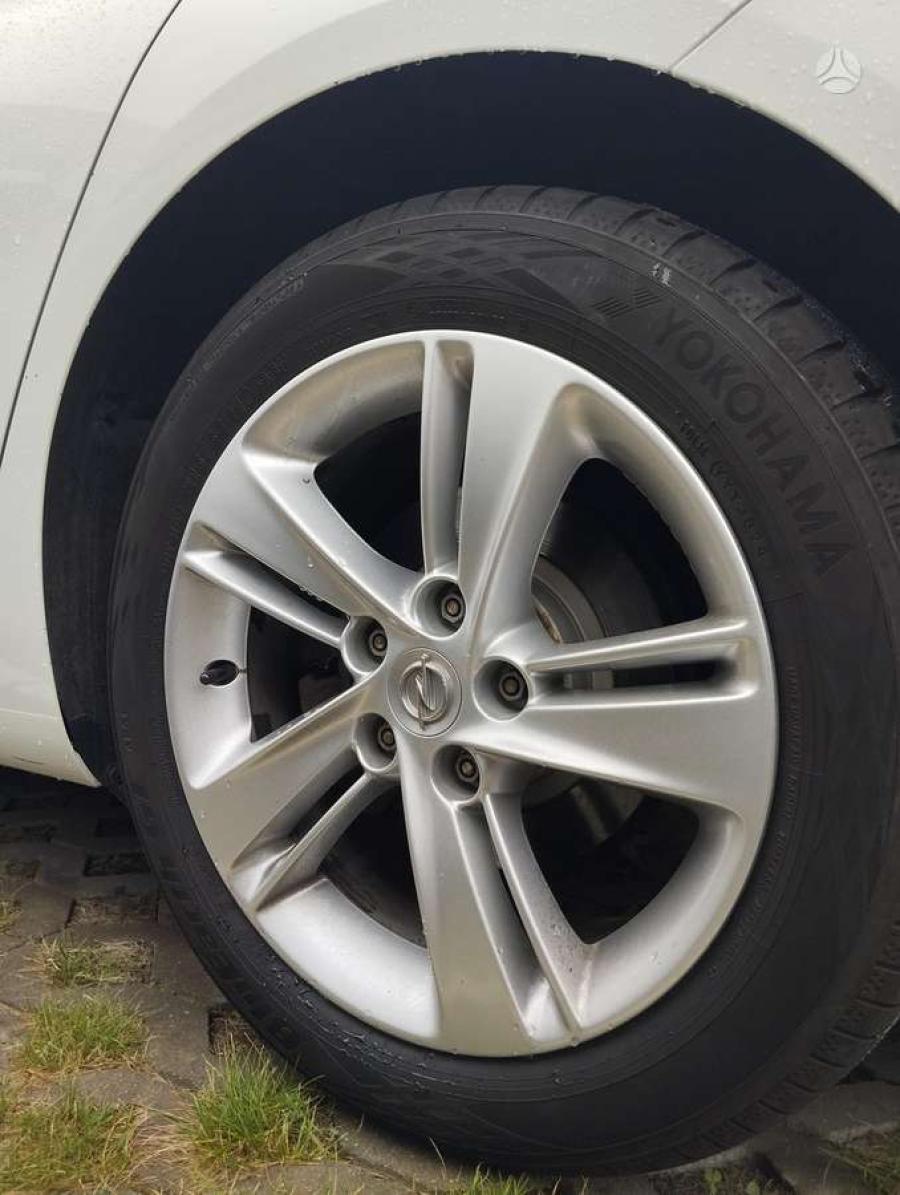 White Opel Insignia 2021 in Vilnius, with an engine capacity of 1.50 L and mileage of 195 thousand km for 9990 €, photo 23 on AUTOMOTO.COM.LV